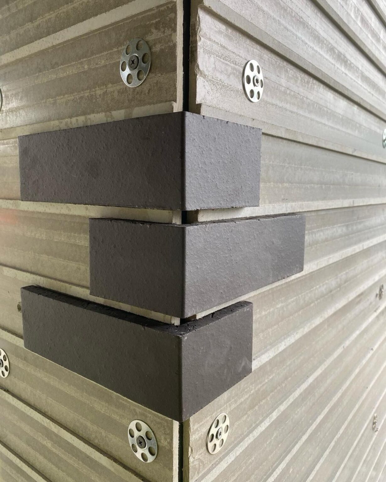 Brick Slip cladding panel tracking system